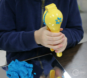 Here's an Easy Preschool Playdough Idea that Strengthens Fine Motor Skills