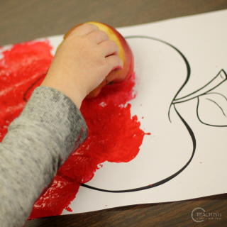 How to Put Together a Toddler Apple Activity with Lots of Action