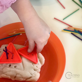 Toddler Triangle Shapes Activity that Also Builds Fine Motor Skills