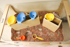 Rice Sensory Play With Funnels {Fine Motor Fun!}