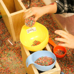 Rice Sensory Play With Funnels {Fine Motor Fun!}